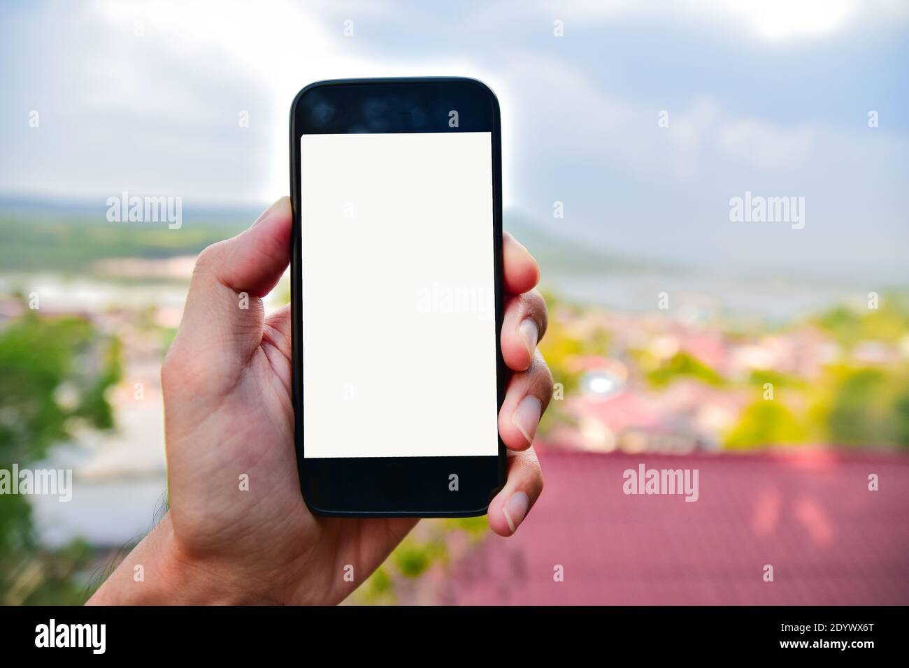 Hand holding smartphone sky background,Phone technology concept Stock ...