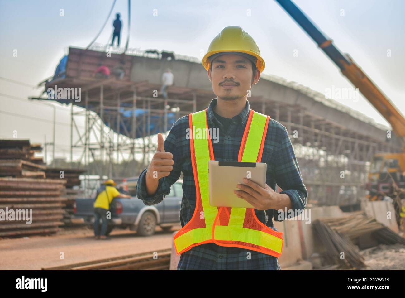 Foreman holding tablet use technology inspection control construction ...