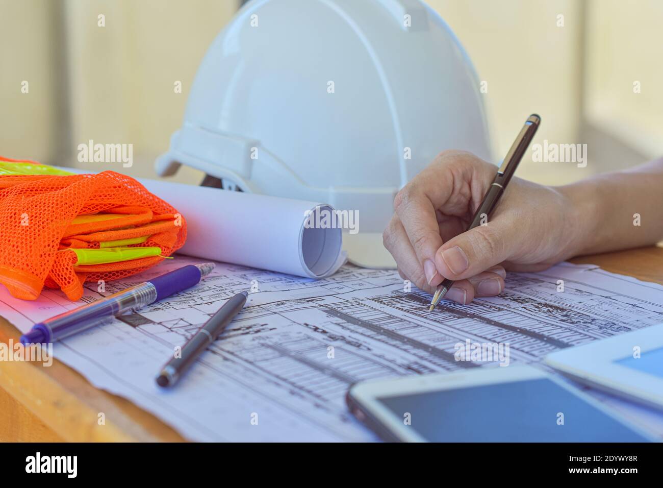 Supervisor holding pen writing on paper document working,Close up hand ...