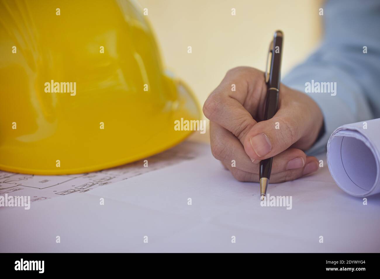 Supervisor holding pen writing on paper document working,Close up hand ...