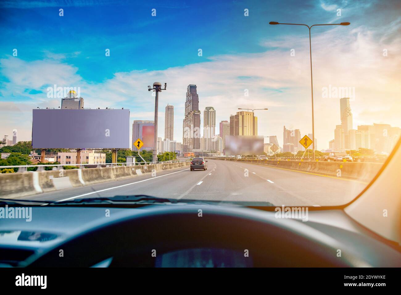 Car driving on highway road in the city Stock Photo - Alamy