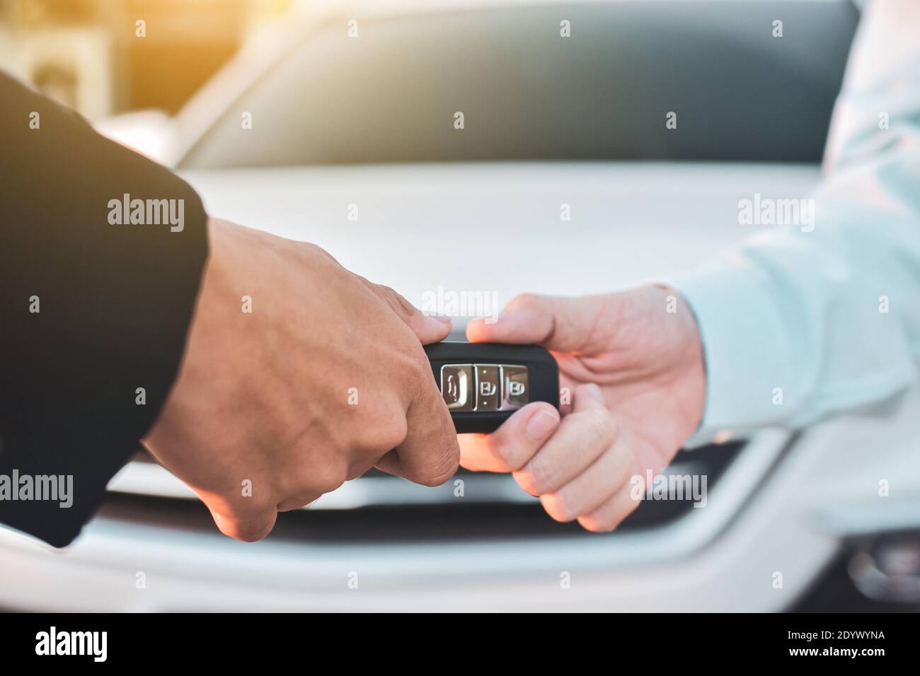 Close up hand holding Key sale car concept,Give and take key car Stock ...
