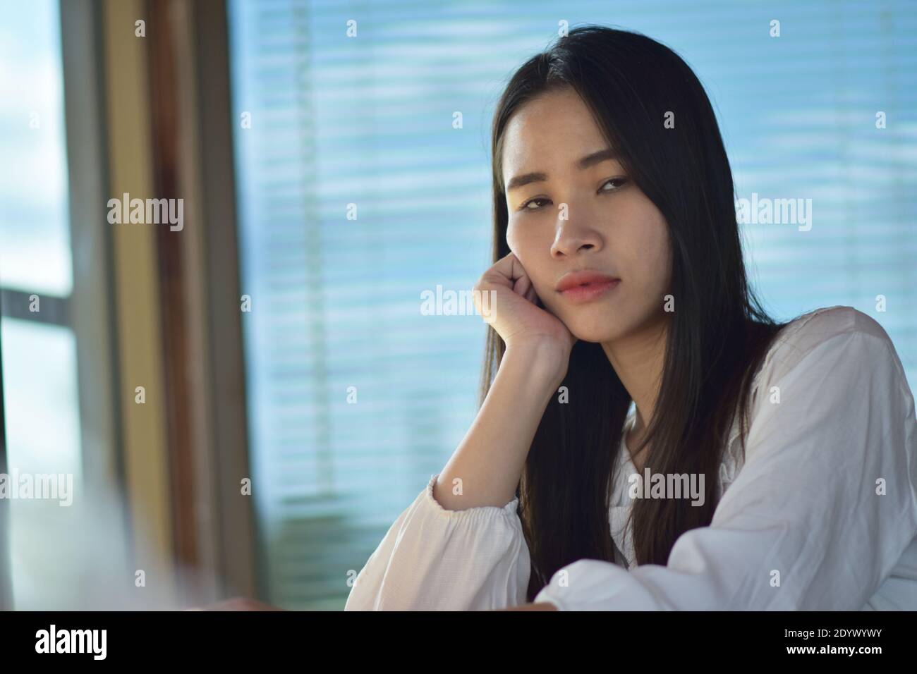 female clerk sleepy at the office desk in the afternoon Stock Photo - Alamy