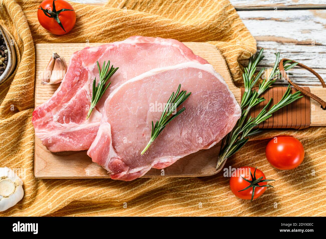 Raw pork cutlet. Organic meat steak. White background. Top view Stock ...