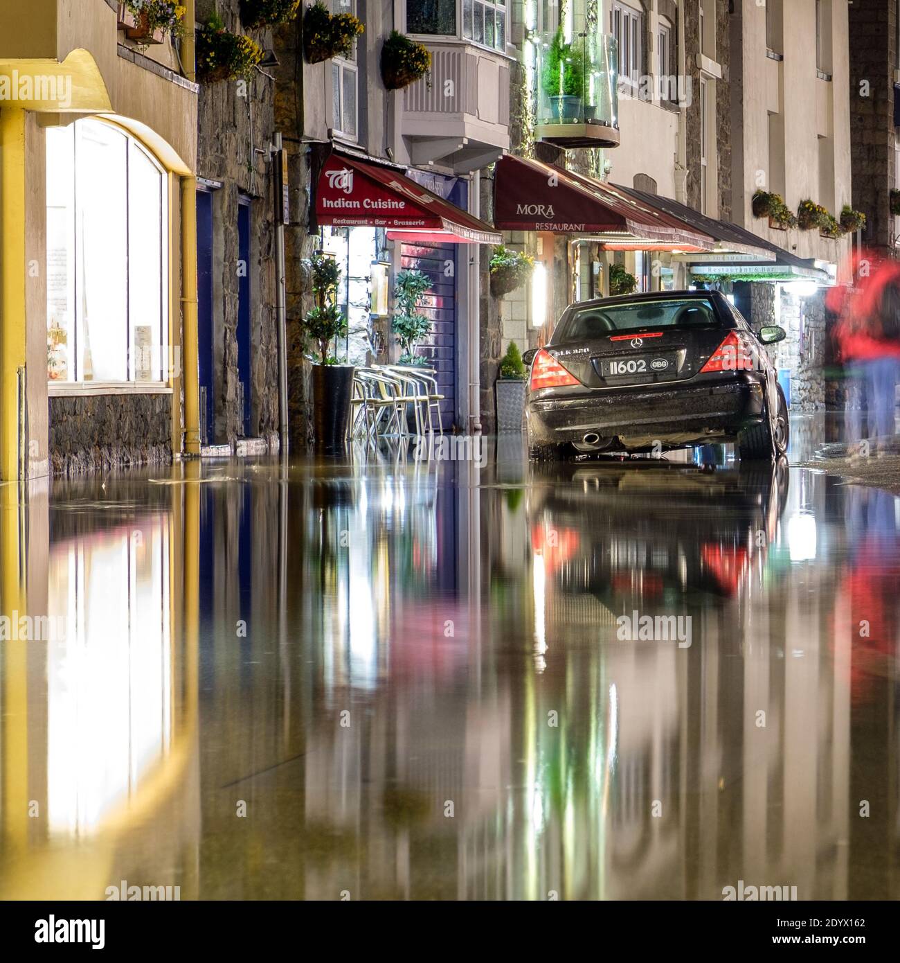 High tide, seafront flooding, Guernsey Stock Photo - Alamy