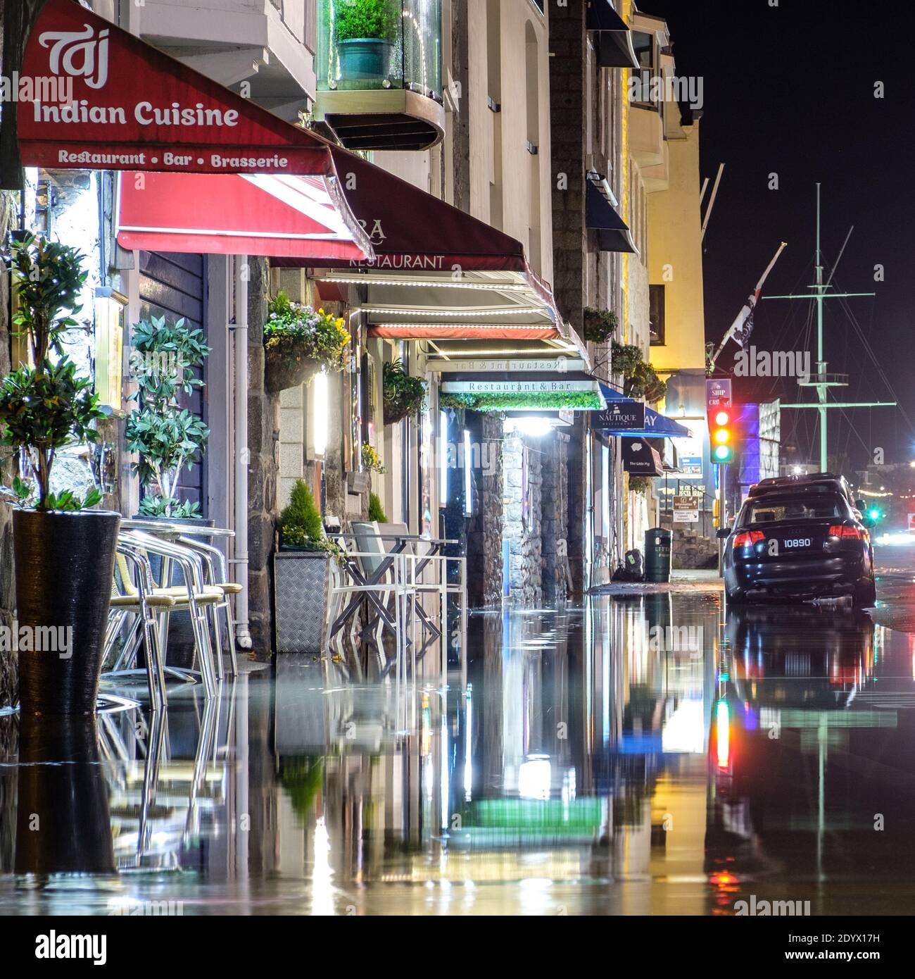 High tide, seafront flooding, Guernsey Stock Photo - Alamy
