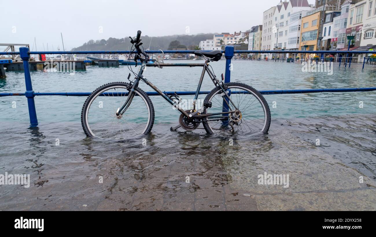 High tide flooding at St Peter Port, Guernsey Stock Photo - Alamy