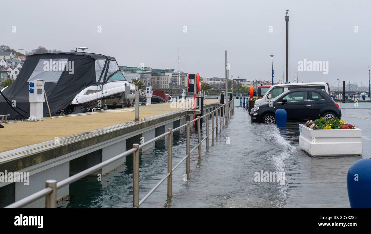 High tide flooding at St Peter Port, Guernsey Stock Photo - Alamy