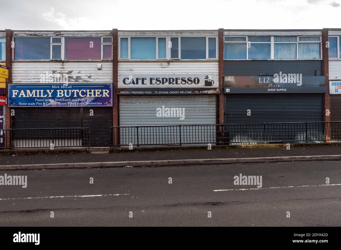 Row of 3 shops in a block hi-res stock photography and images - Alamy