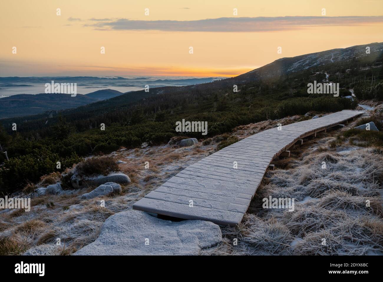 Mountain hiking trail during a frosty winter morning Stock Photo - Alamy