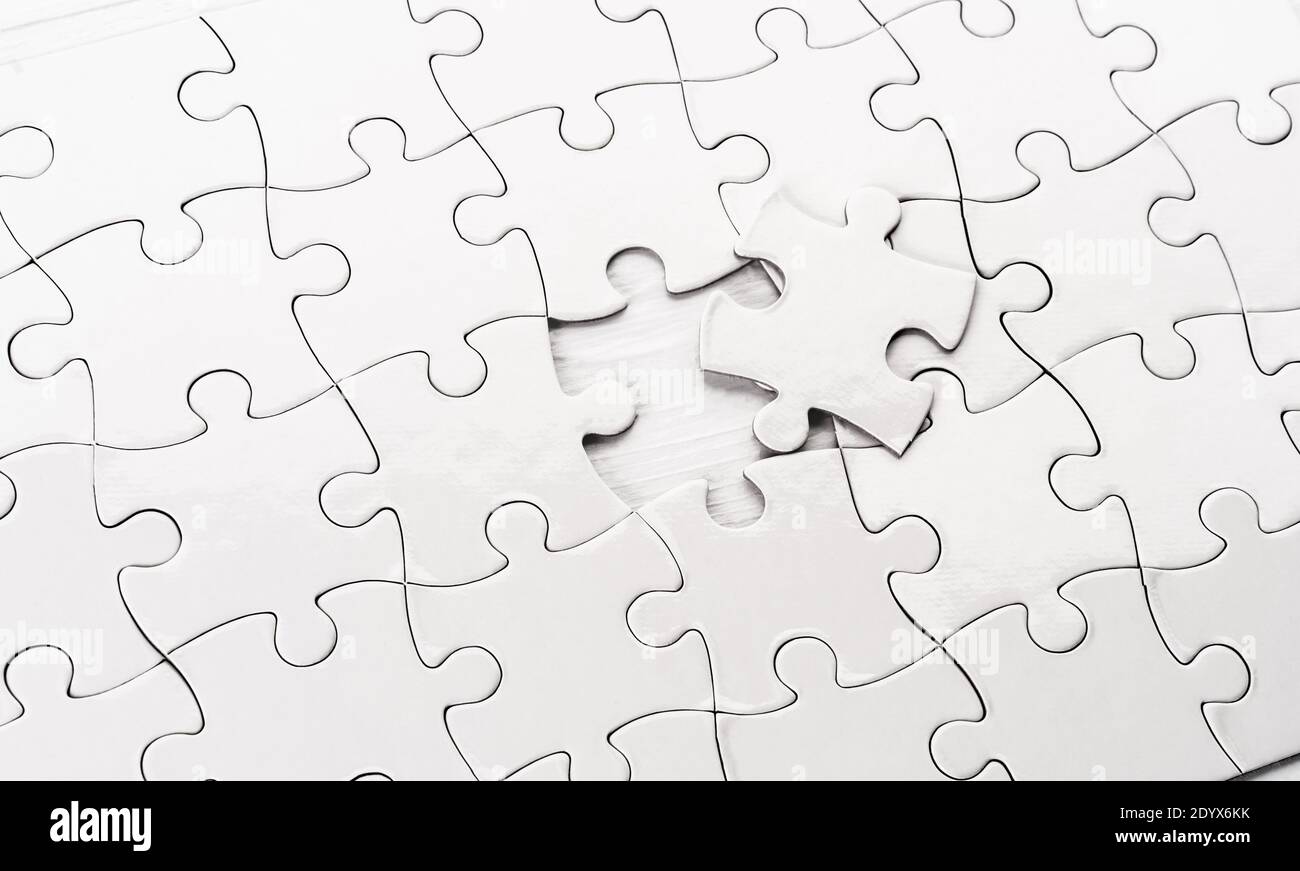 Close up view of unfinished jigsaw puzzle Stock Photo - Alamy