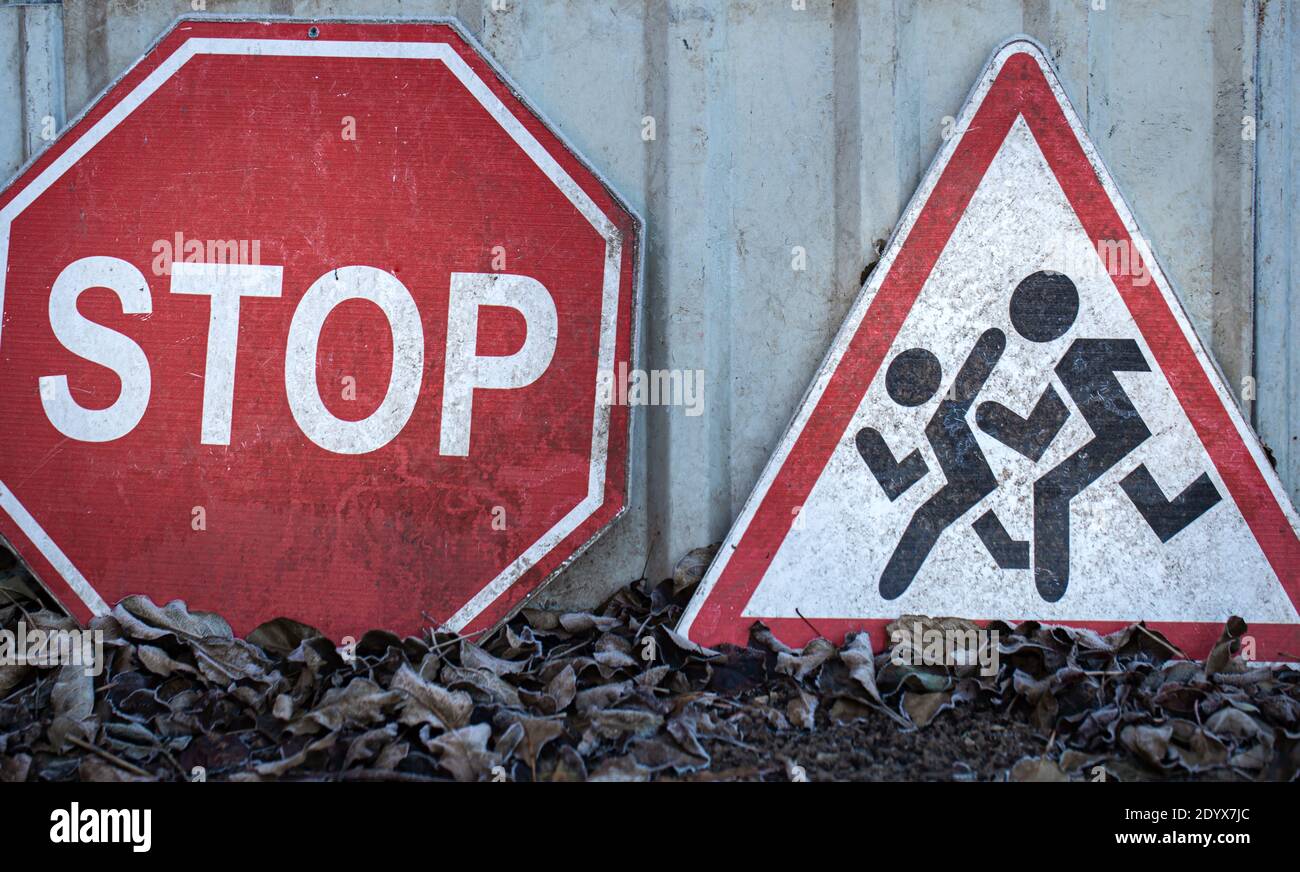 Road signs lie on the ground. Concept of road safety Stock Photo - Alamy