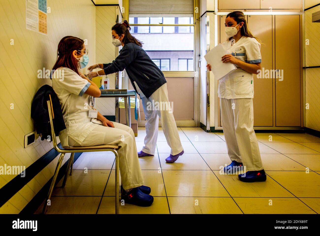 Rome, Rome, Italy. 28th Dec, 2020. A young nurse receives the first ...