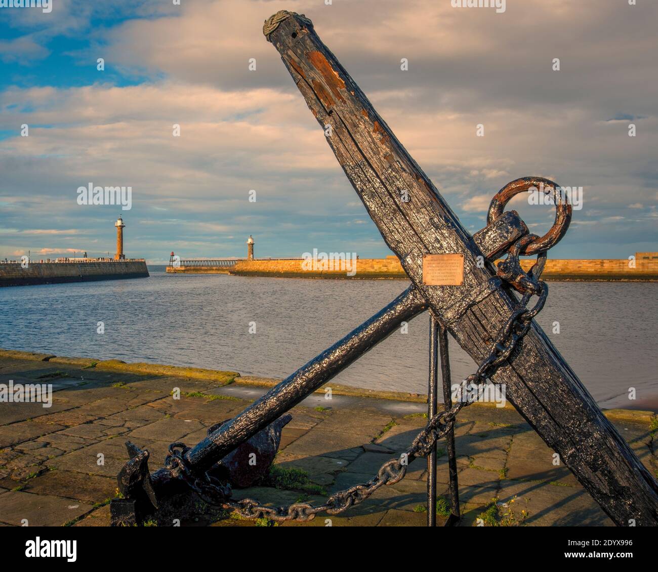 An ancient anchor on the harbour wall in Whitby Stock Photo - Alamy