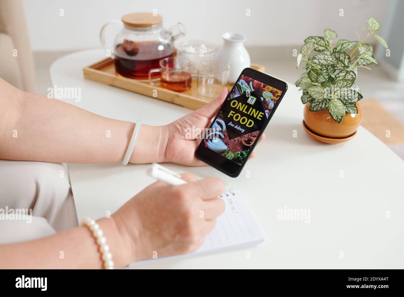 Woman ordering food hi-res stock photography and images - Alamy
