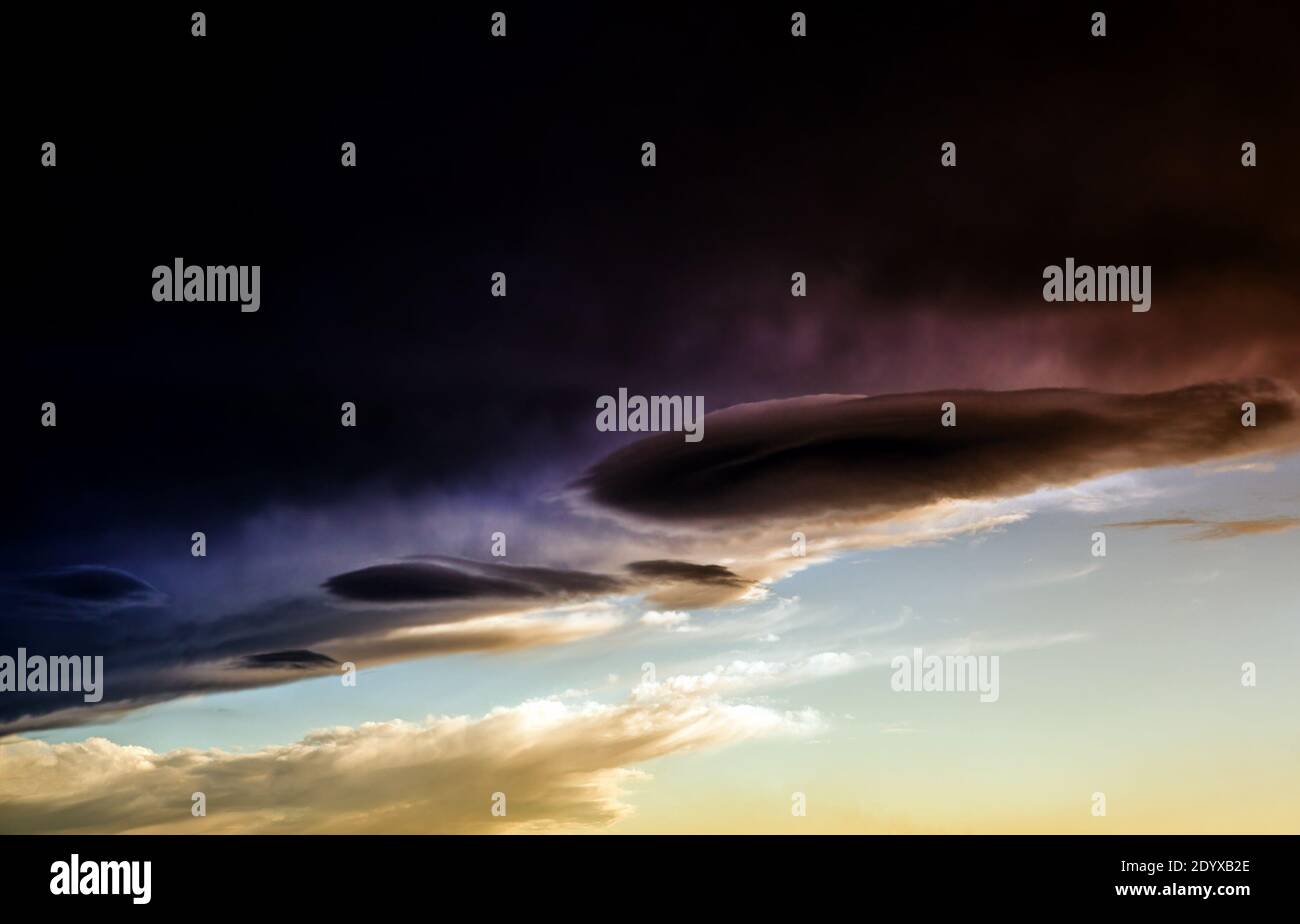 Abstract Dramatic Clouds Contrast with a Clear Sky Stock Photo - Alamy