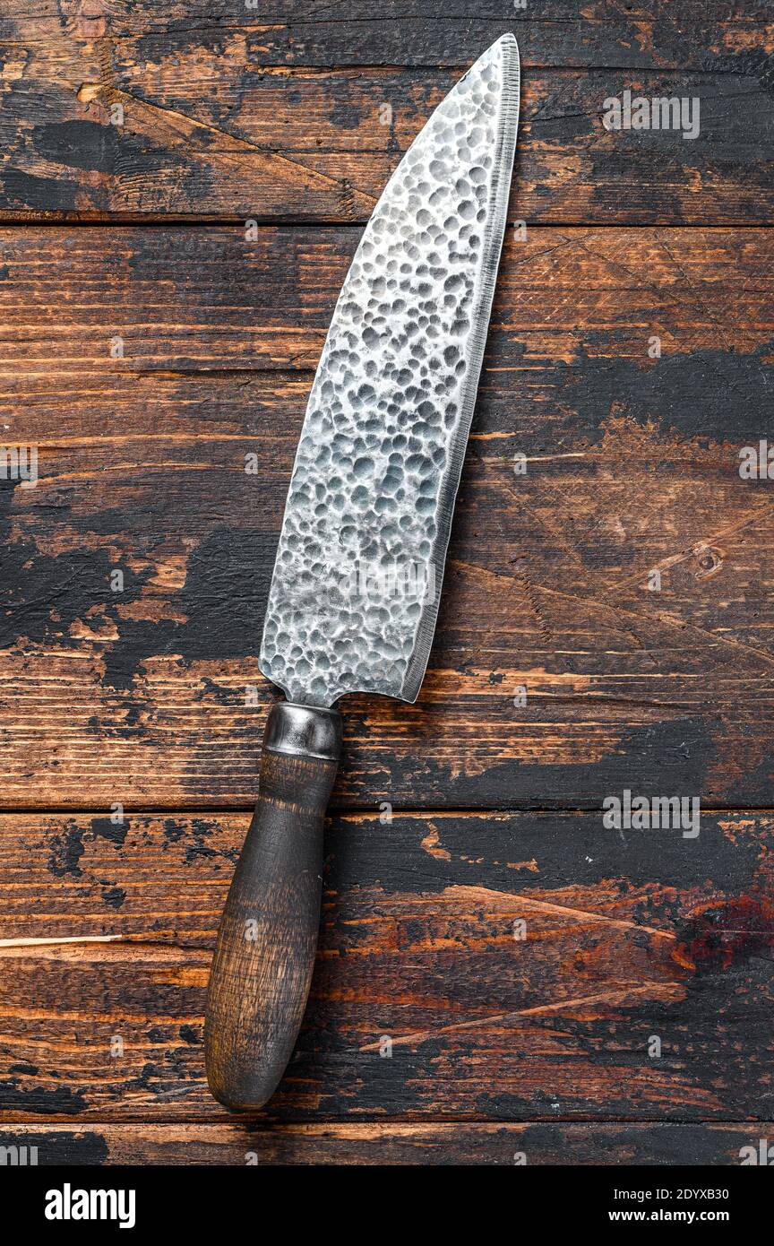 Vintage butcher meat knife. Dark wooden background. Top view Stock ...