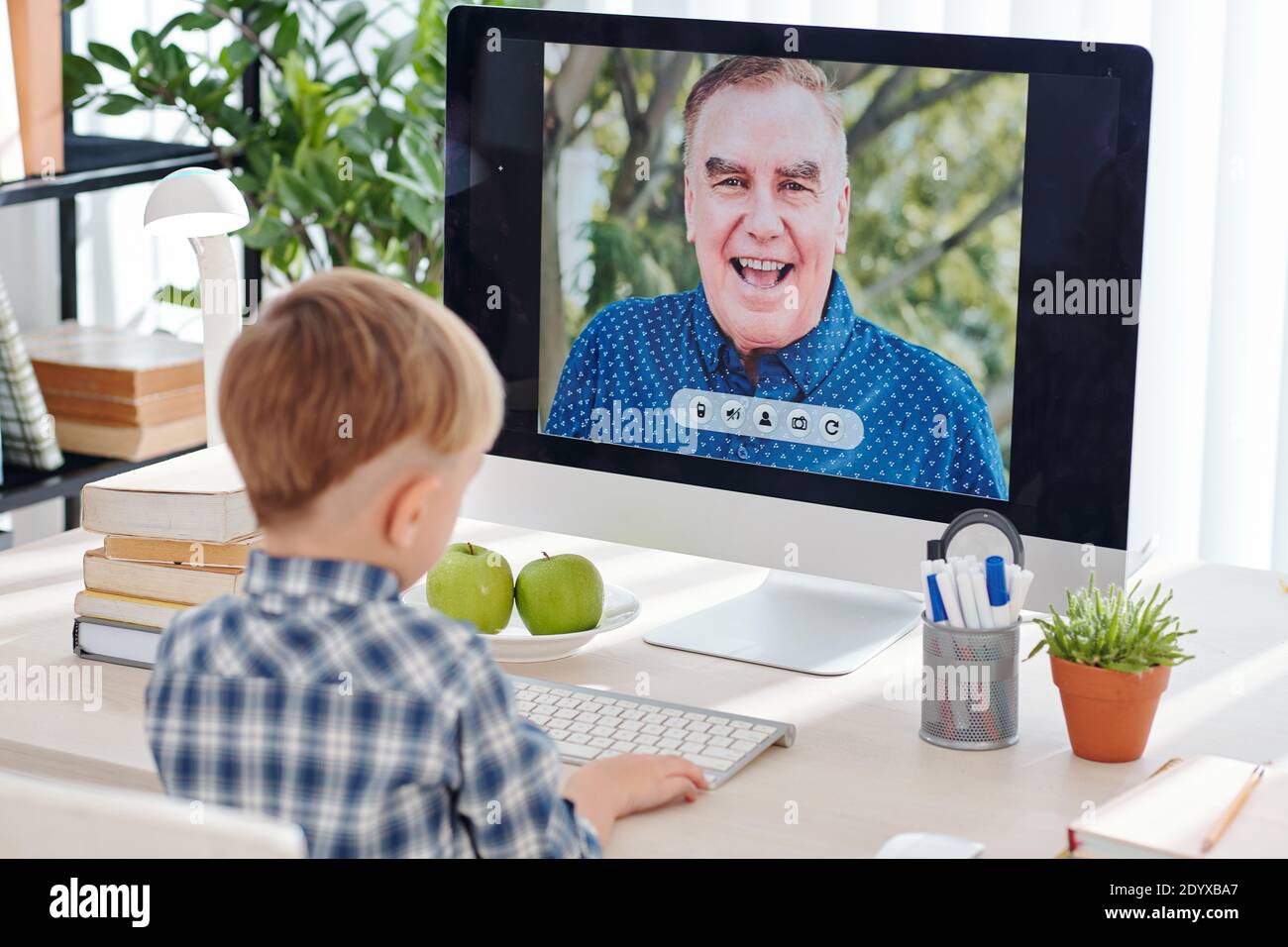 Boy having online class Stock Photo - Alamy