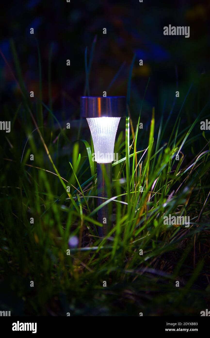 Solar lamp by night in garden hi-res stock photography and images - Alamy