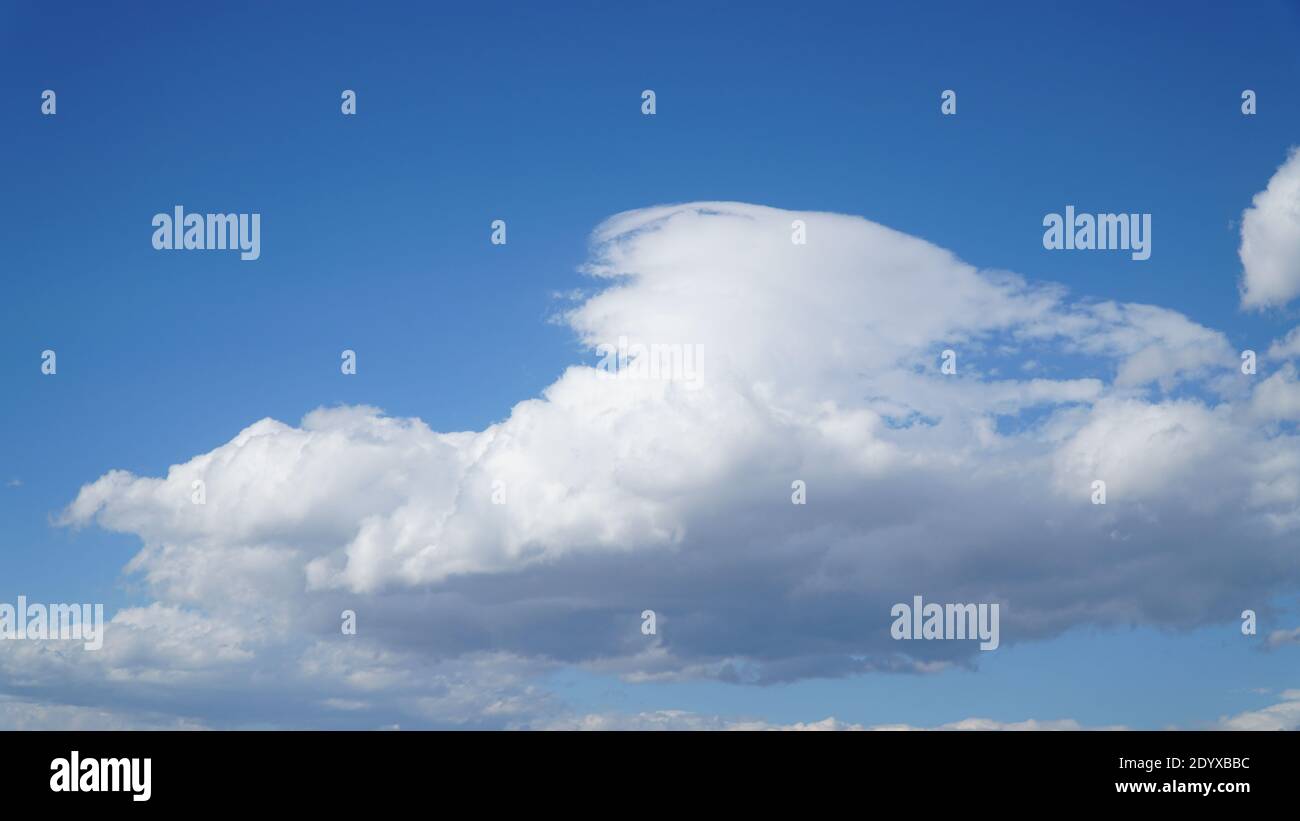 Beautiful bright deep blue sky fluffy white clouds hi-res stock ...