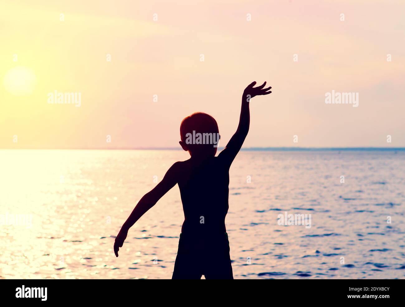 Boy waving goodbye hi-res stock photography and images - Alamy