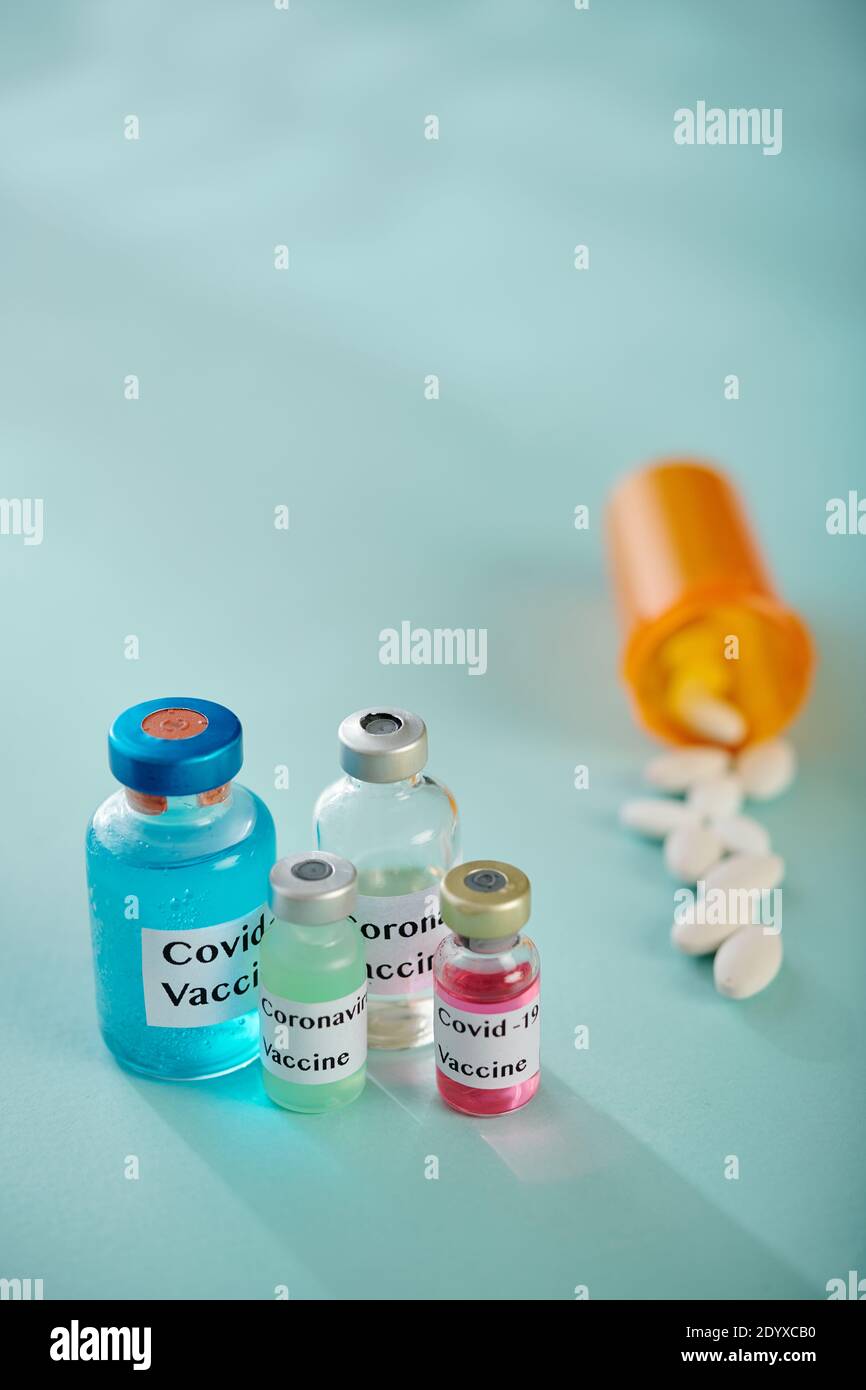 Vaccines and tablets Stock Photo - Alamy