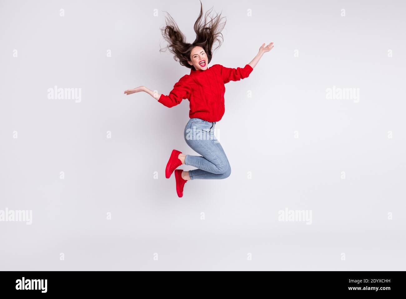 Full length body size photo of jumping girl throwing hair laughing in ...