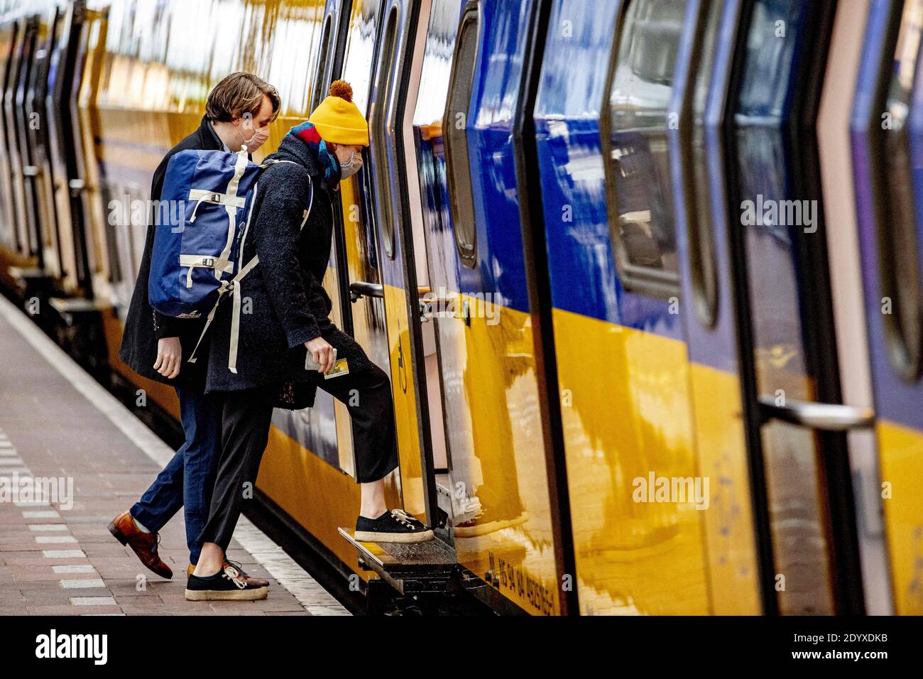 Protective face masks are mandatory at stations, in trains and public ...