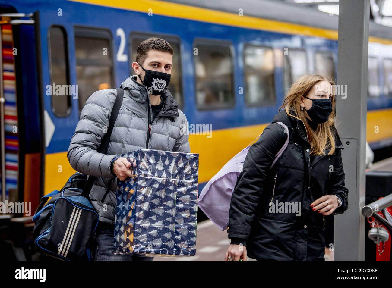 Protective face masks are mandatory at stations, in trains and public ...