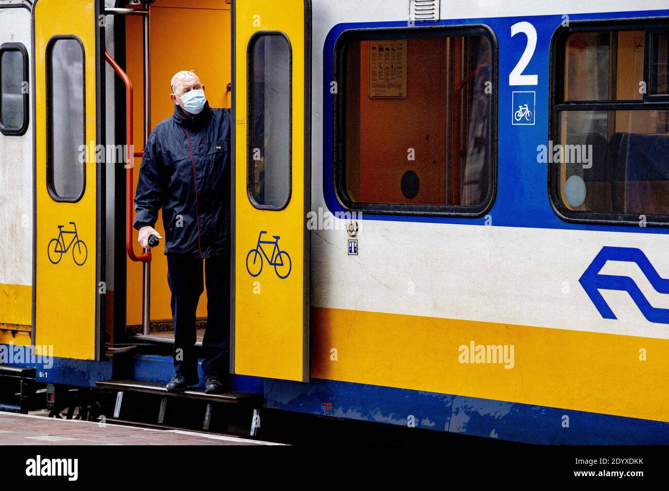 Protective face masks are mandatory at stations, in trains and public ...