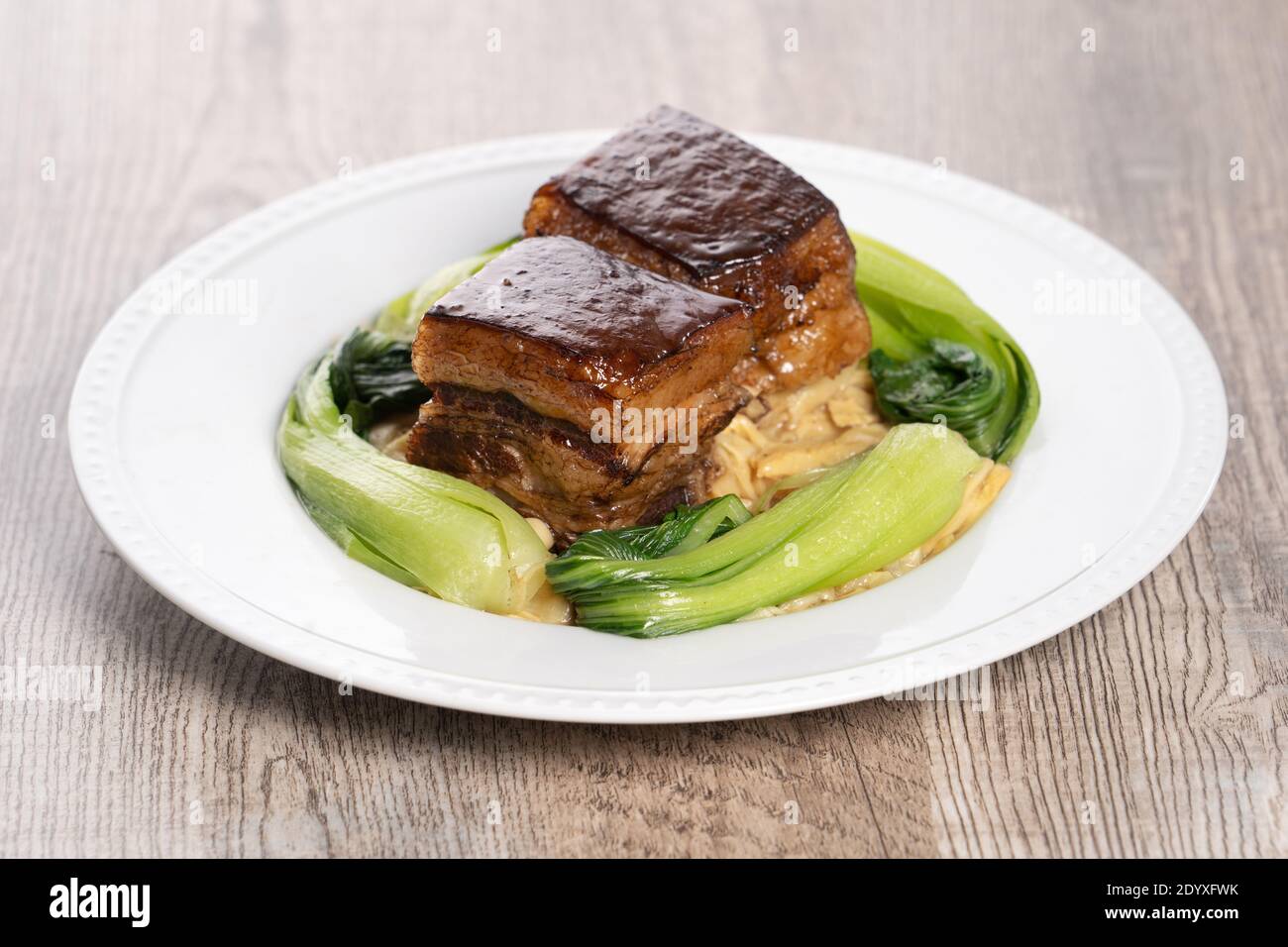 Dong Po Rou (Dongpo pork meat) in a beautiful blue plate with green ...