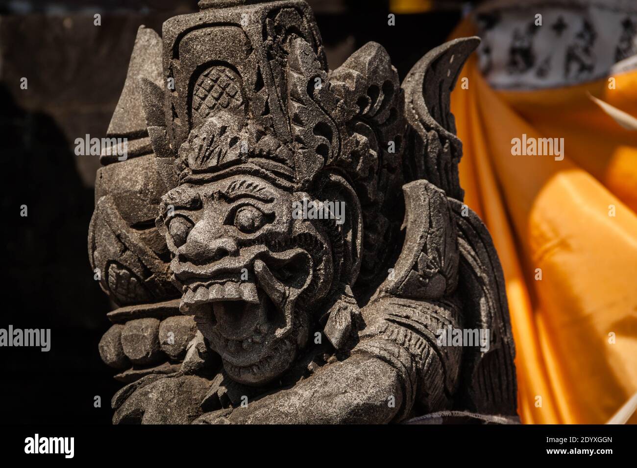 Close up image of a Dvarapala (gate guardian) statue at Tanah Lot ...
