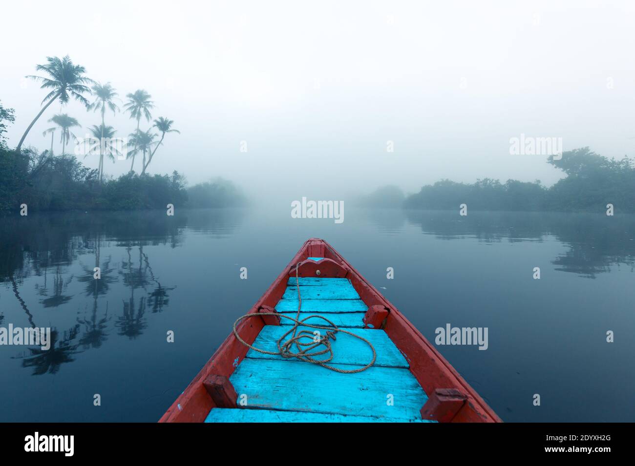 Small boat on a river in Cambodia Stock Photo - Alamy