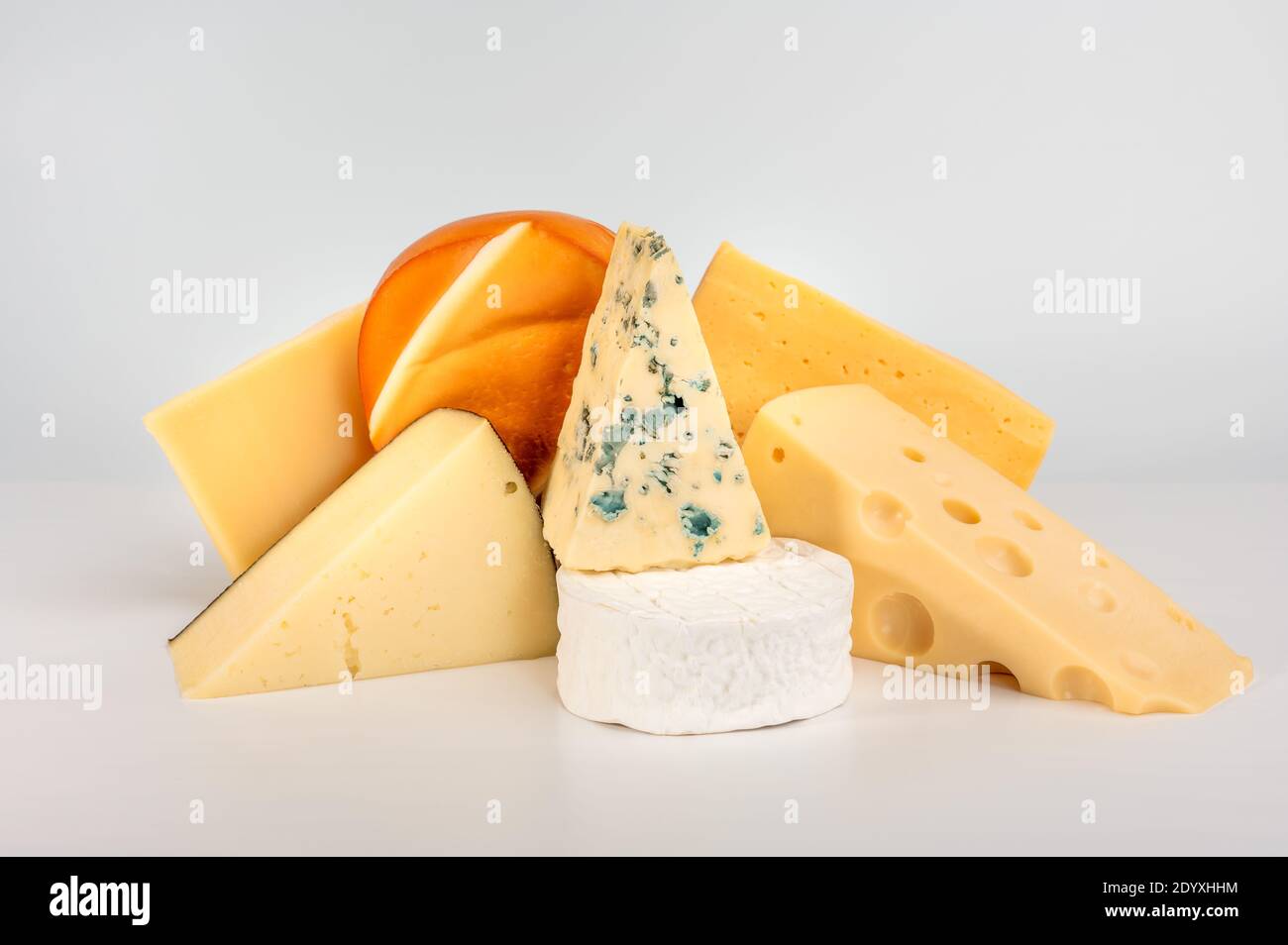 Various types of cheese isolated on gray background. blue cheese Dorblu ...