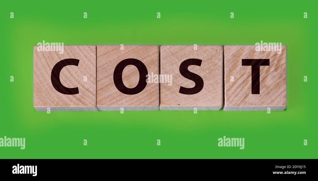 Word Cost made with wood building blocks. Expences business concept ...