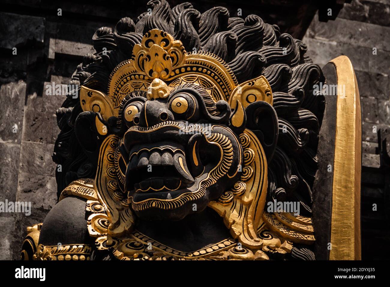 The statue of a Dvarapala at Tanah Lot Temple in Bali. A Dvarapala is a ...
