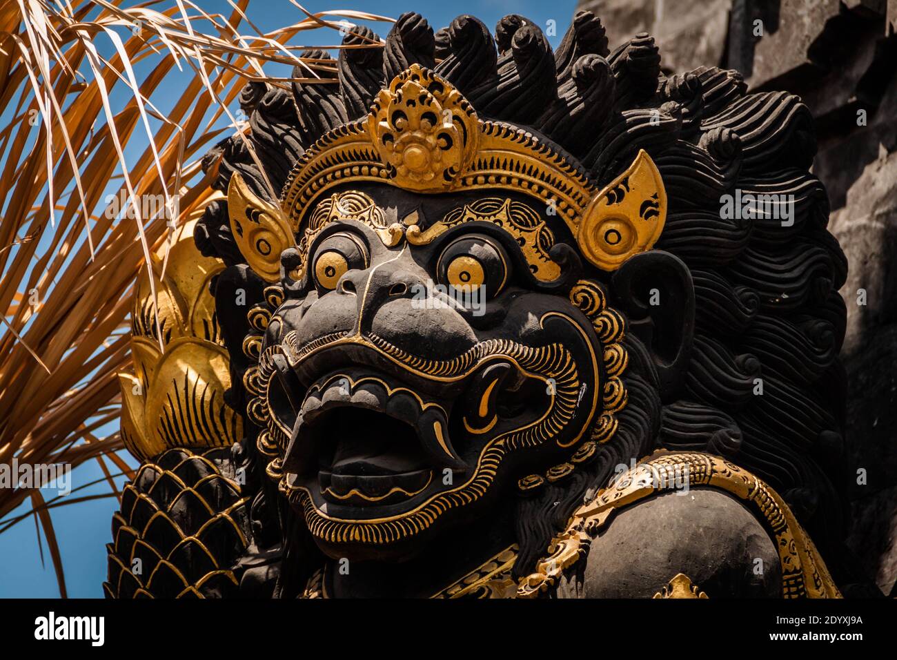 A close-up face image of the giant Dvarapala (gate guardian) at Tanah ...
