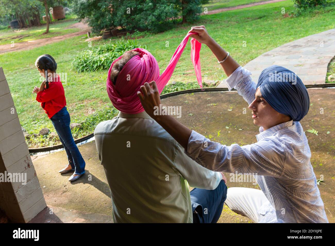 TAMIL NADU, INDIA - November 2020: Tying a Sikh turban before a ...