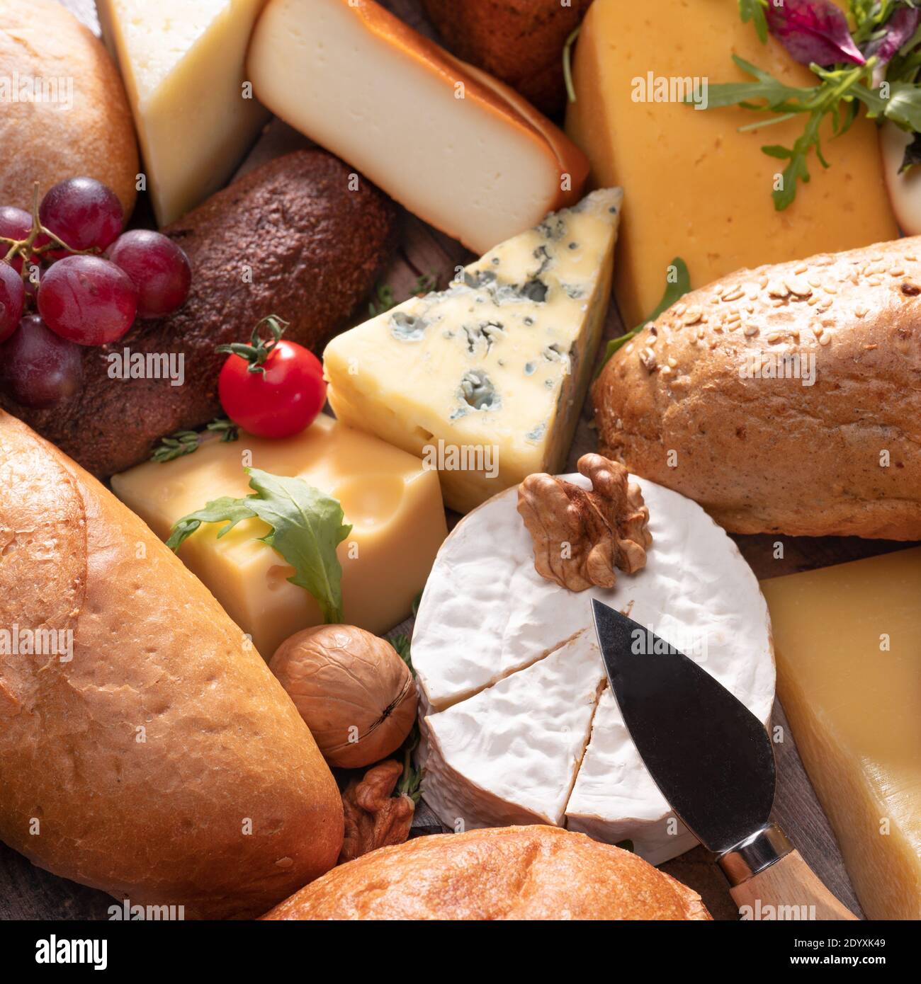 cheese and bread. many types of bread and cheese. cheese platter ...