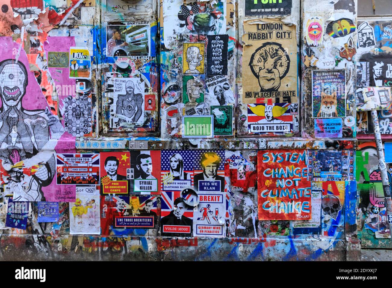 Posters, stickers and political graffiti , Brick Lane, East London ...