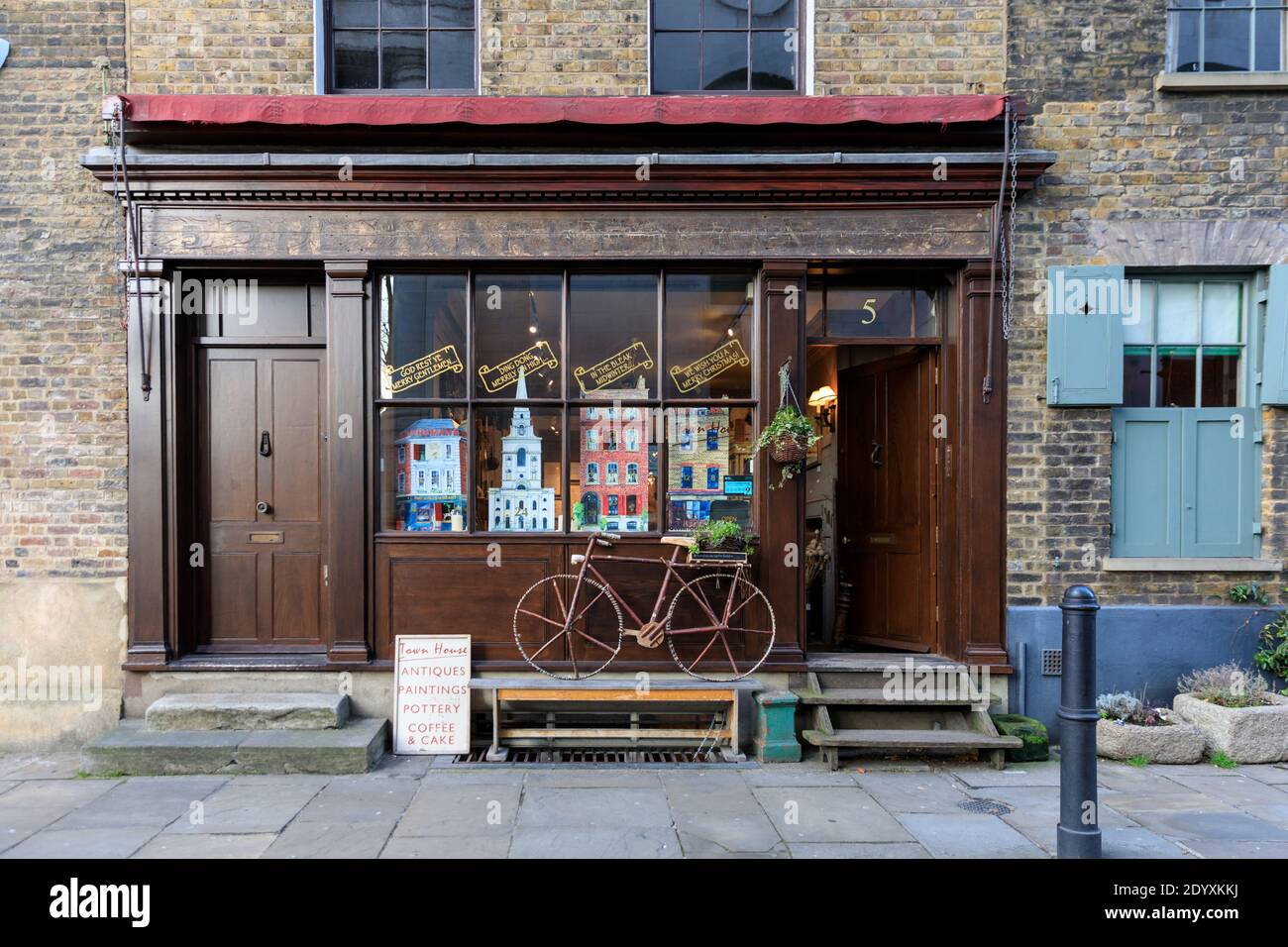 Shop exterior on historic 19th century building in Founier street ...