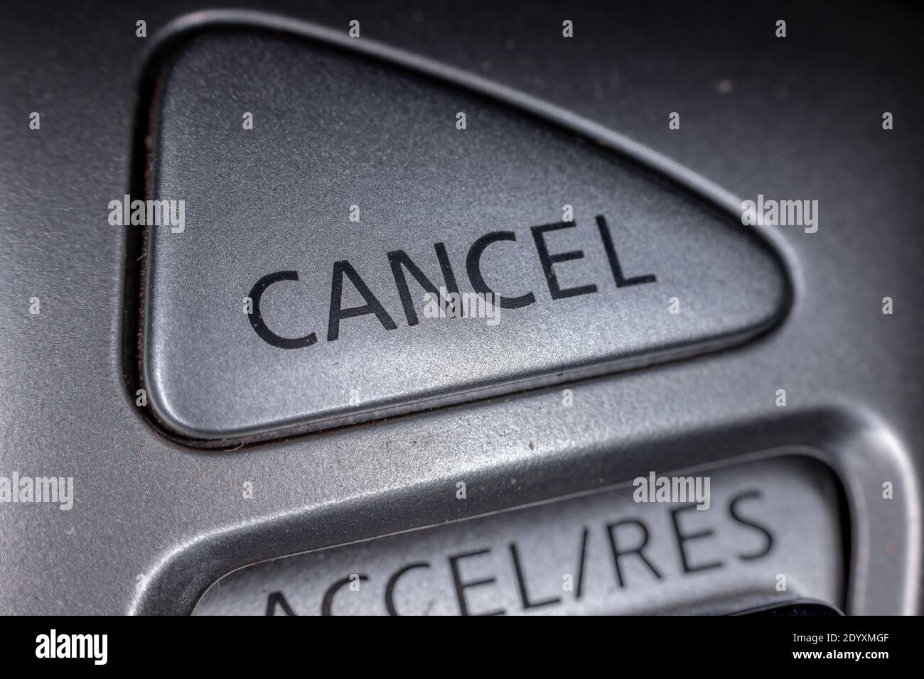 Cancel button on a car cruise control panel Stock Photo - Alamy