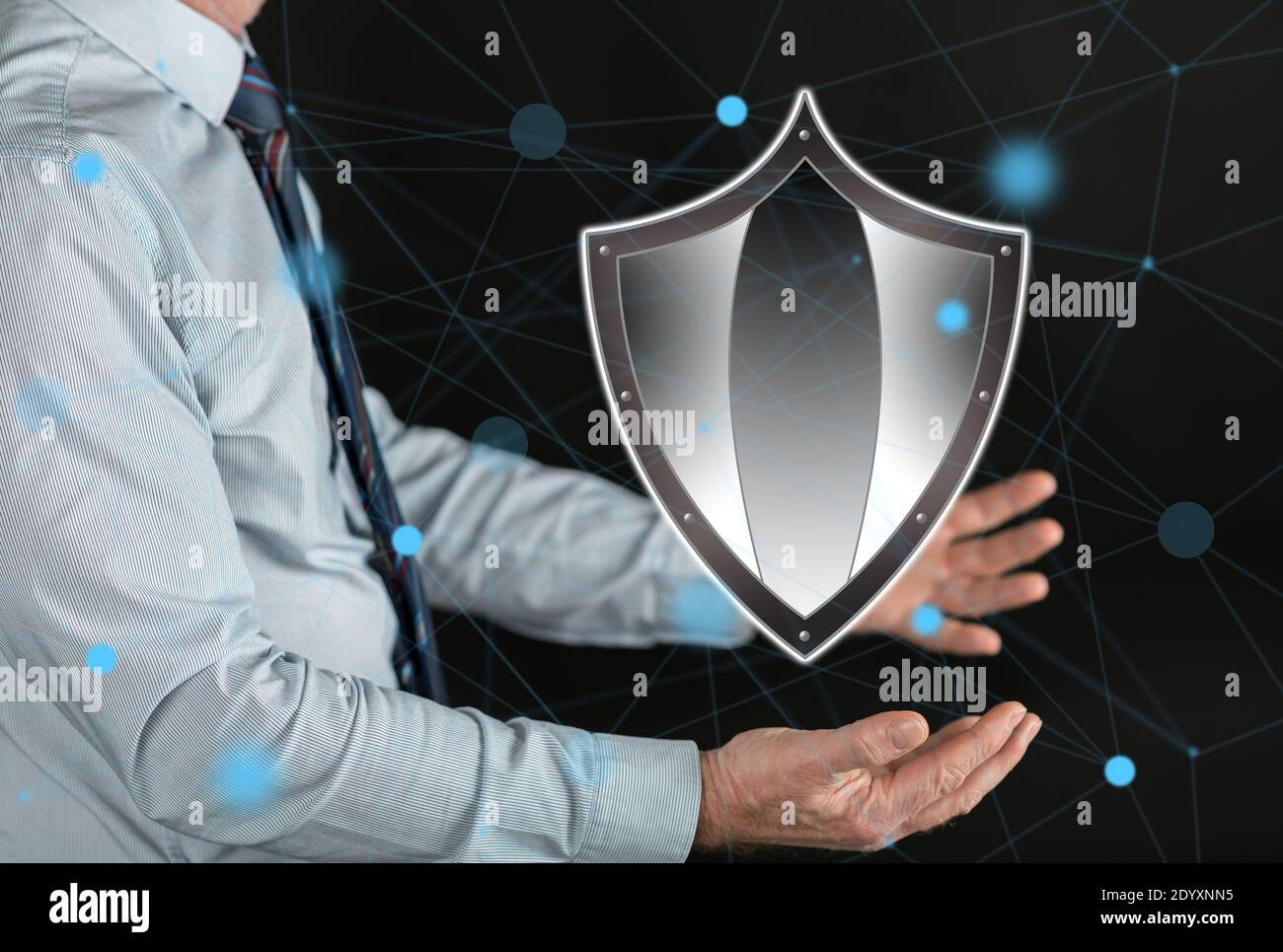 Protection concept above the hands of a man Stock Photo - Alamy