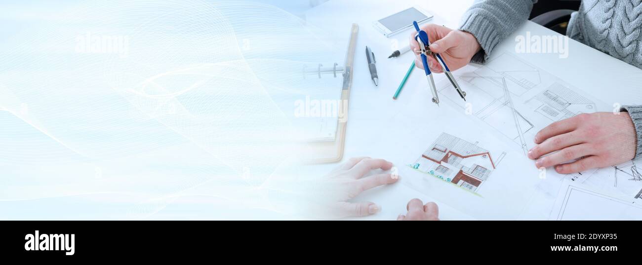 Architect showing house plans to his client; panoramic banner Stock ...