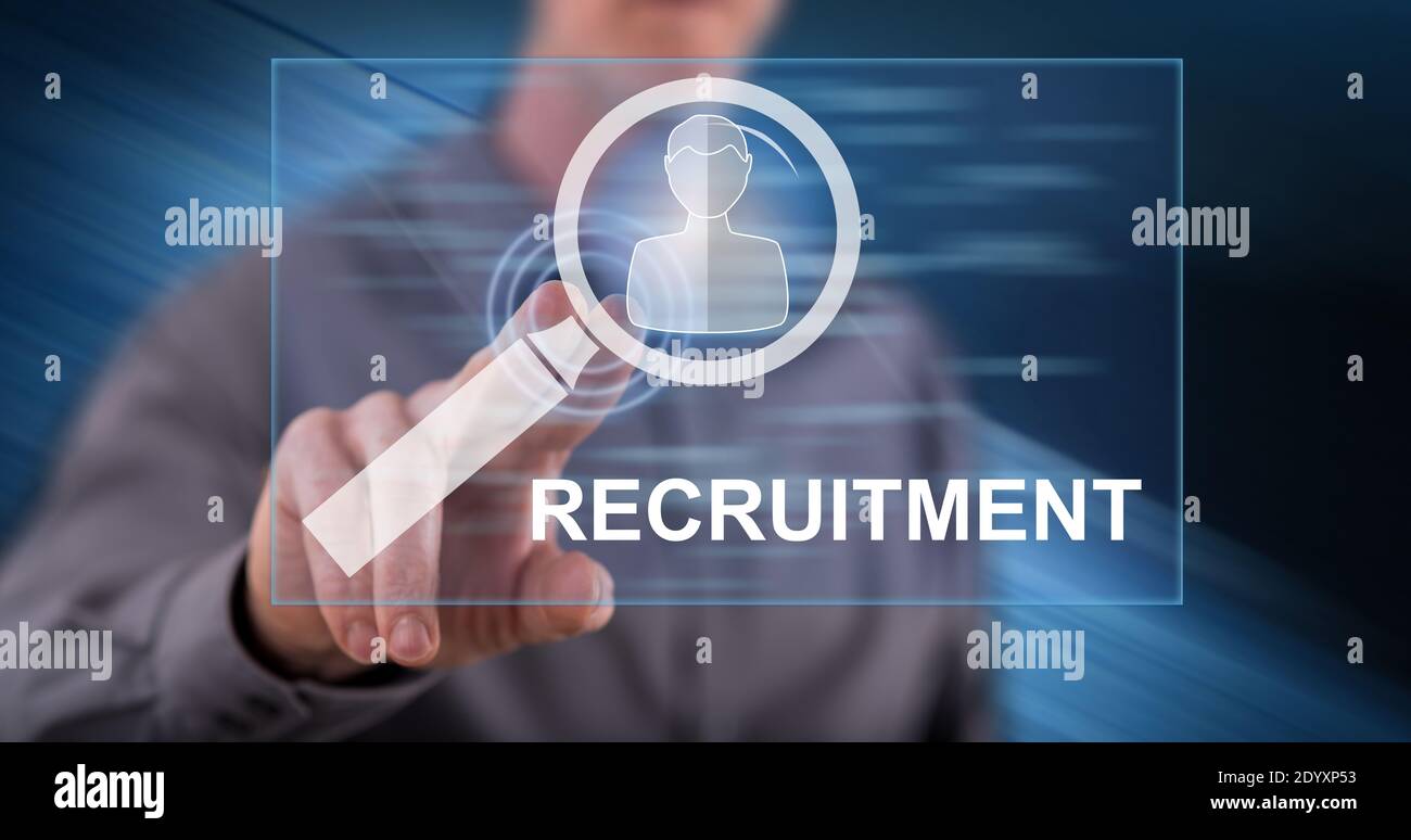 Man touching a recruitment concept on a touch screen with his finger ...