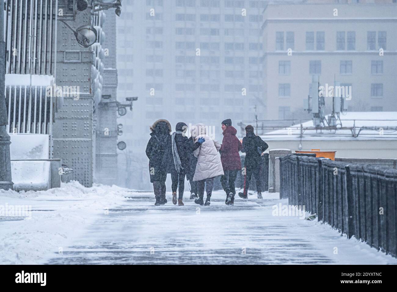 Snowfall in Moscow, Russia. People walk in a street Stock Photo - Alamy