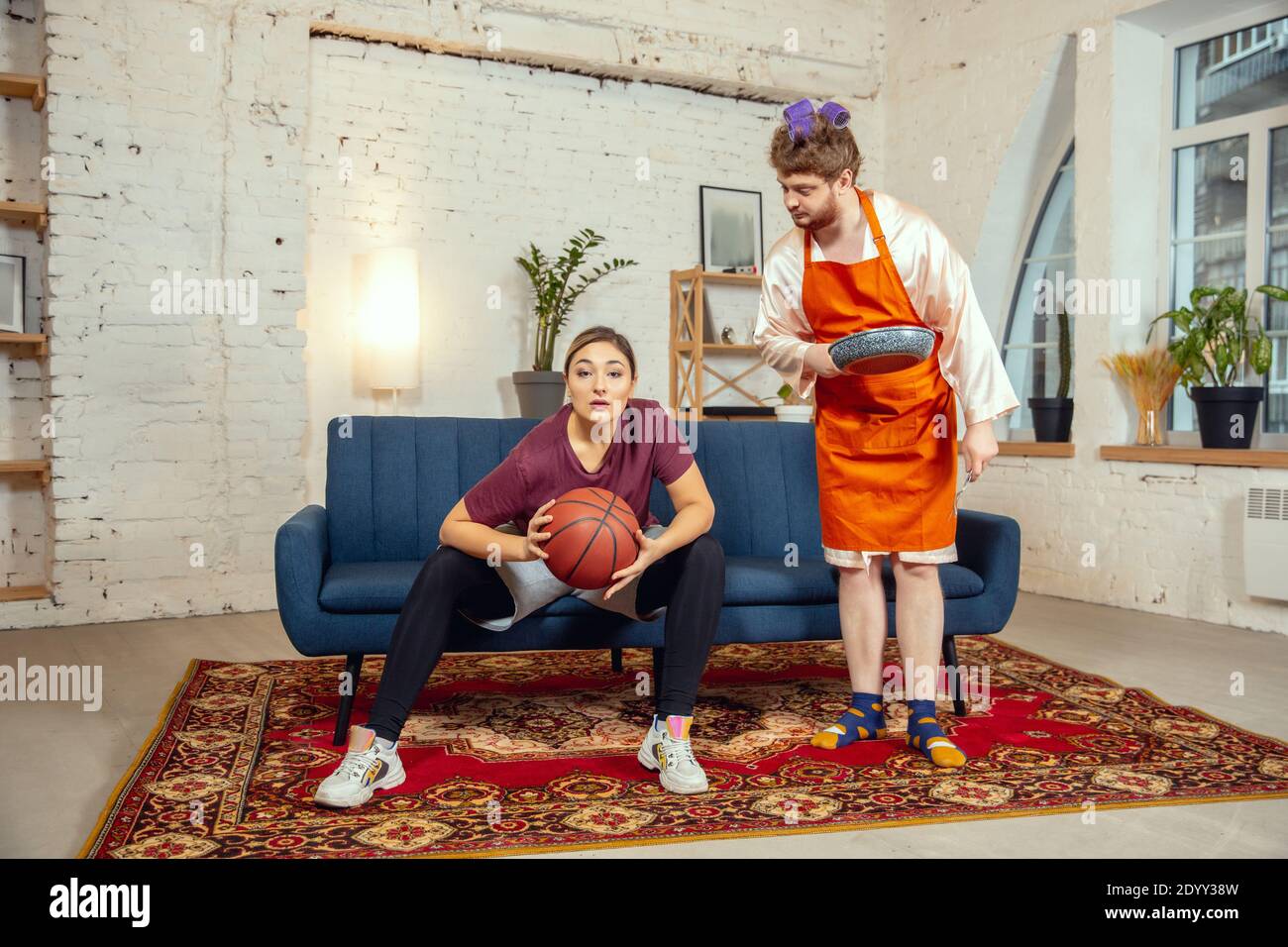 Gender stereotypes. Wife and husband doing things unusual for their ...