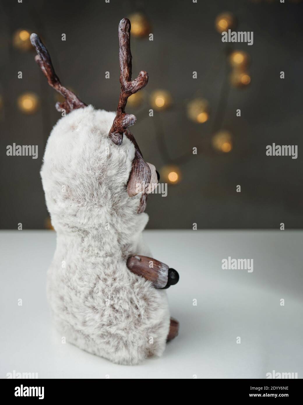 Handmade toy made of polymer clay fawn side view Stock Photo - Alamy