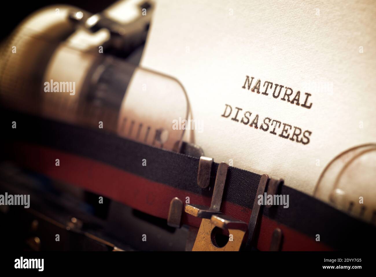 Natural disasters phrase written with a typewriter Stock Photo - Alamy