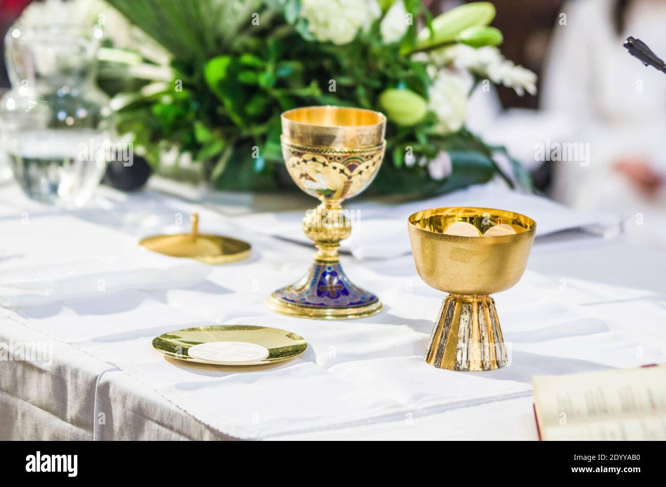 altar with consecrated host that becomes the body of jesus christ and ...